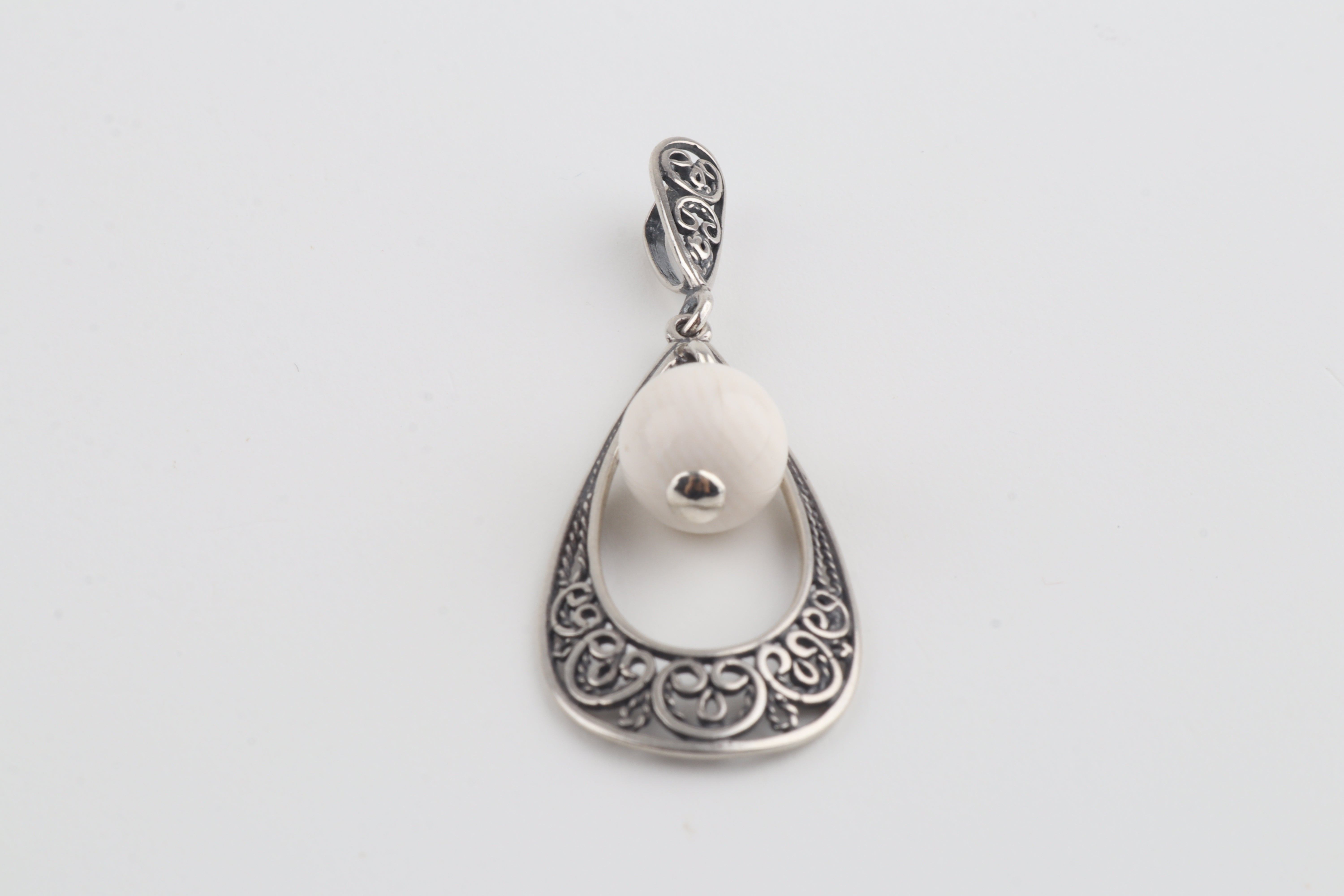 The Silver Blizzard Mammoth Ivory Pendant – Arctic Antiques